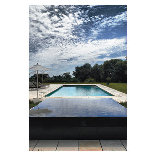 SPA: exterior overflow spa with all-black glass tile - Transitional ...
