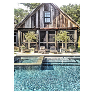 sun-drenched rectangle pool with spa + full-color bluestone decking ...