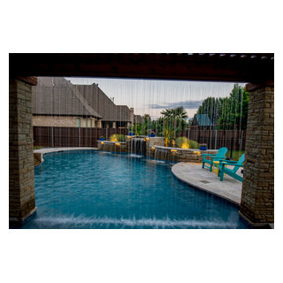 Transitional Curved Cool Pool with Amazing Water Features ...