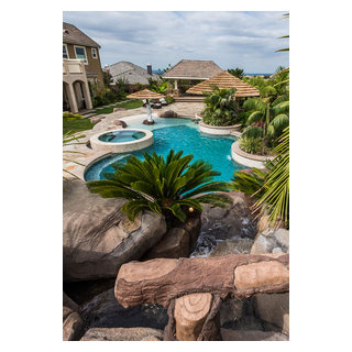 Tropical Beach Entry Pool & Spa with a Rock Slide & Grotto - Tropical ...