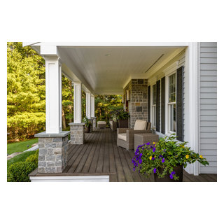 An expansive front porch is a relaxing space to recharge and entertain ...
