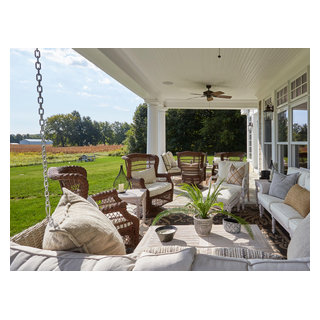 Rear Porch with Porch Swing and Plenty of Seating - Farmhouse - Porch ...