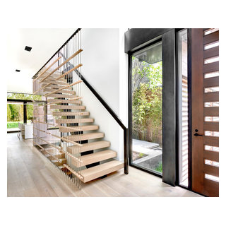 Double-Height Entry Foyer Looking into Courtyard - Contemporary ...