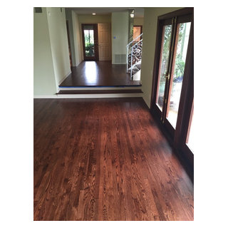 Oak strip flooring in entry and steps with rosewood stain - Traditional ...