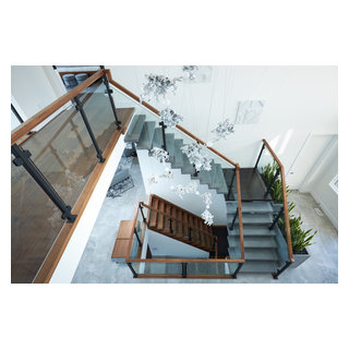 Steel and Concrete Mono Stringer with Clamped Glass Railing System ...