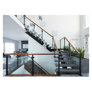 Steel and Concrete Mono Stringer with Clamped Glass Railing System ...