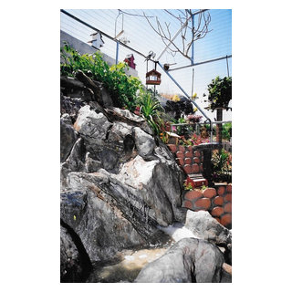 Aviary with artificial rocks - Mediterranean - Sunroom - San Diego - by ...