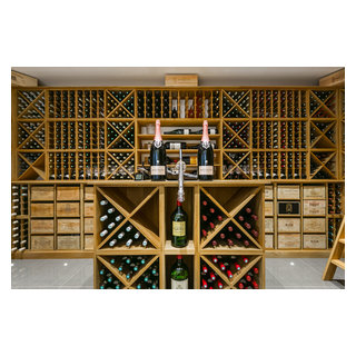 Large private wine room in Wimbledon, London using solid Oak racking ...