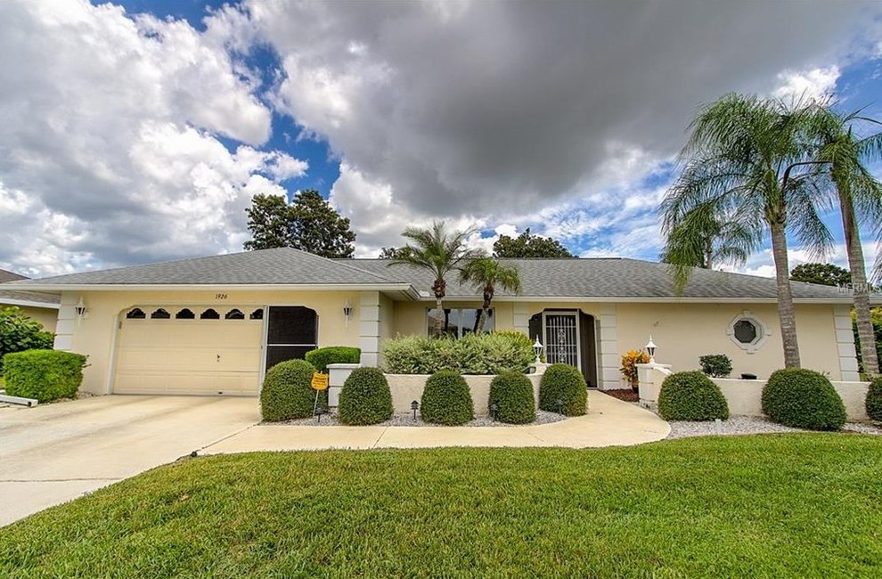 How can I make this 1980s Florida ranch look more MCM