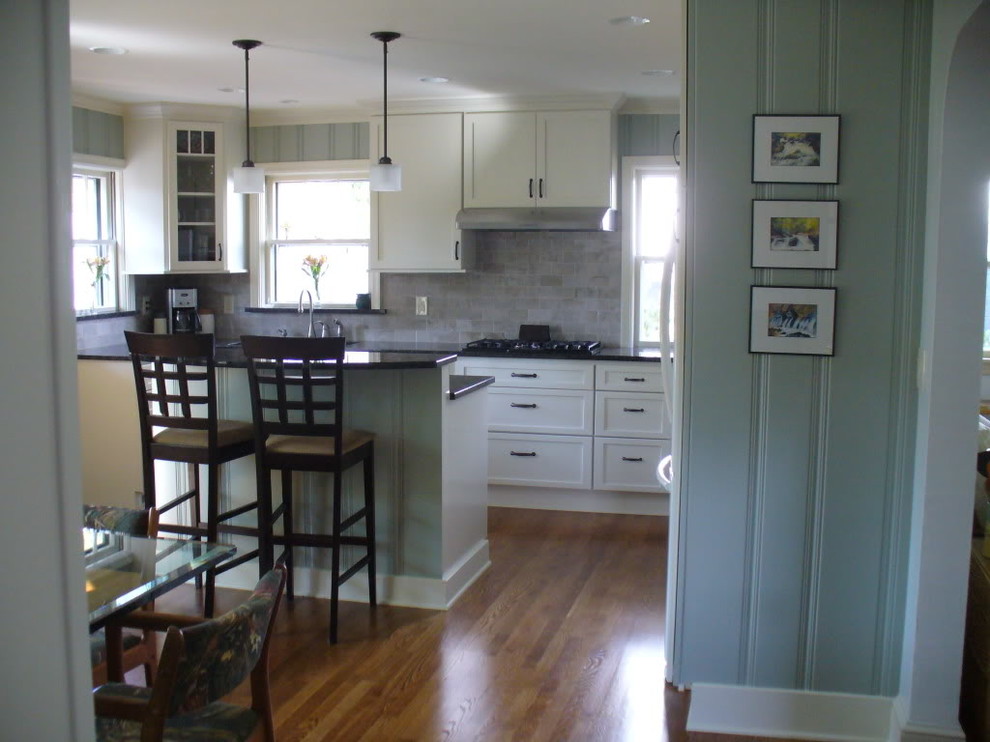 cottage kitchen done, cream cabinets, wood floors