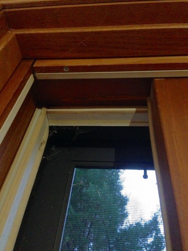 Painting stained wood window frame?