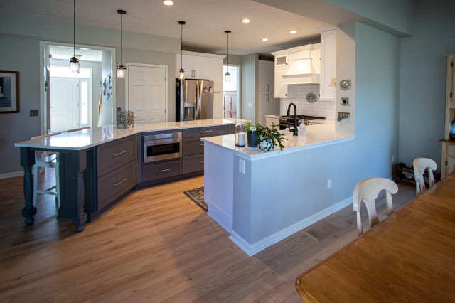 Siteline White Kitchen with Gray Island and Calacatta Miraggio Quartz ...
