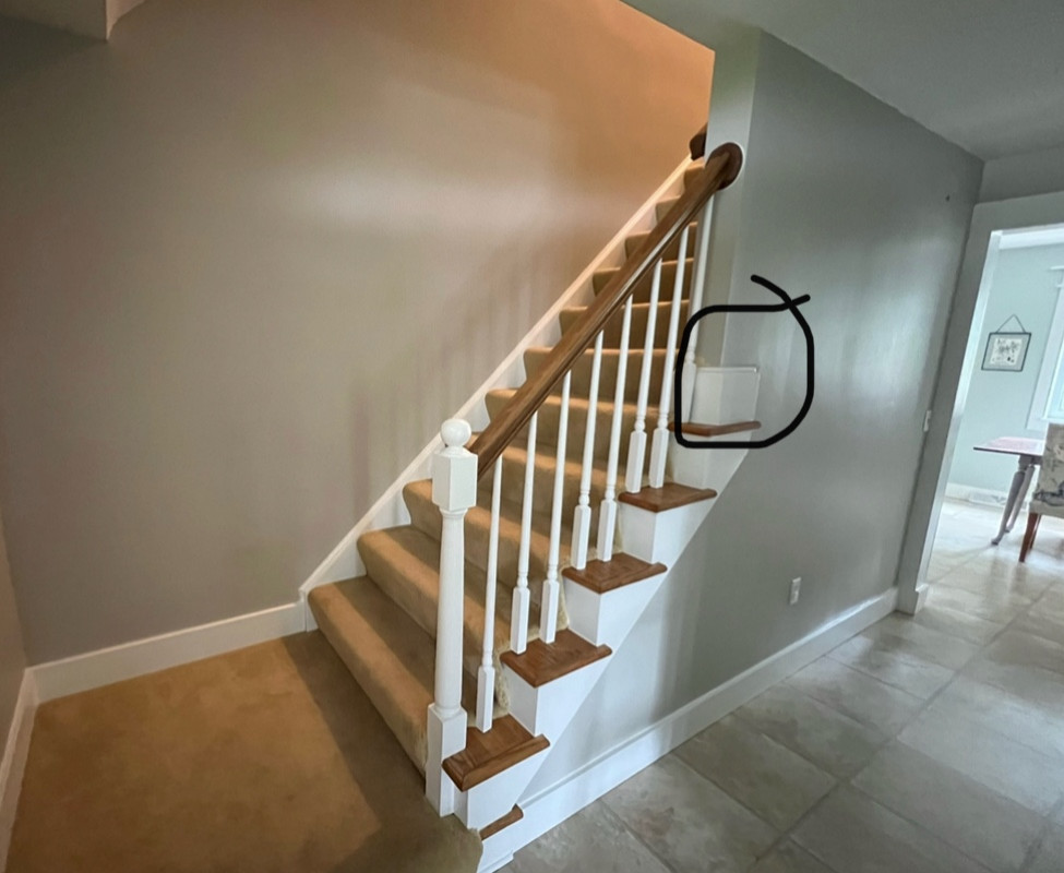 Batten board in entryway/stair stringer