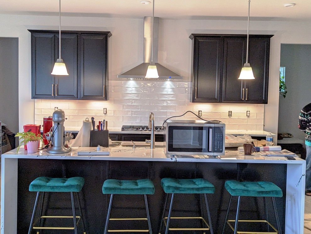 Backsplash till cabinet crown molding or all the way up to ceiling