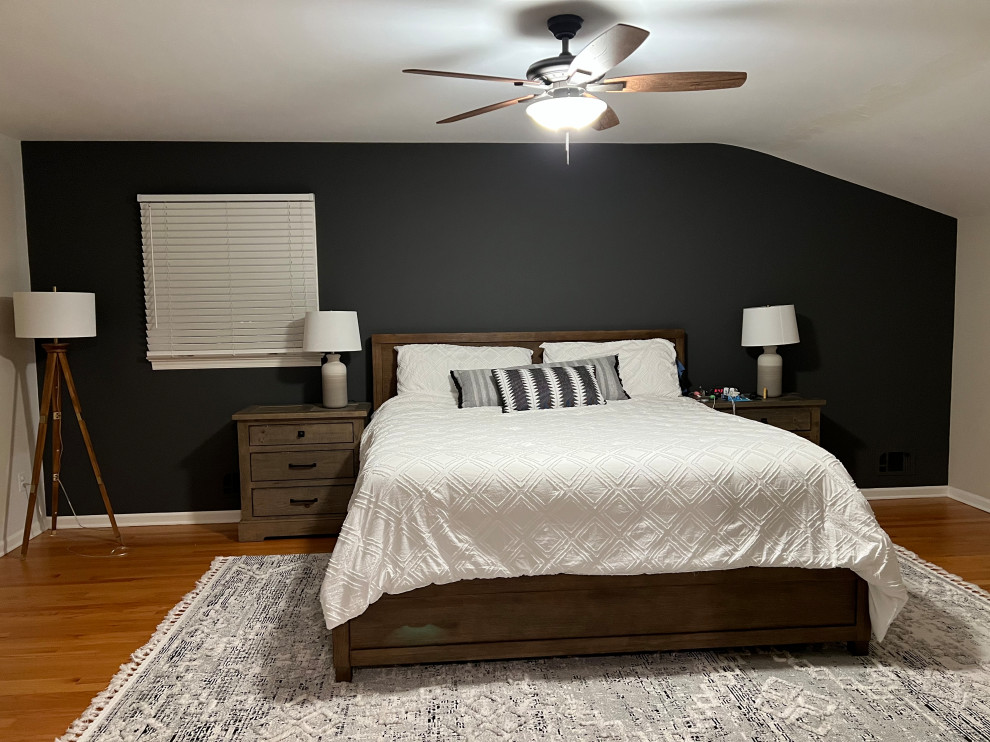 Asymmetrical window on bedroom wall