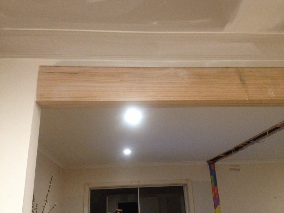 Plaster around exposed beam?