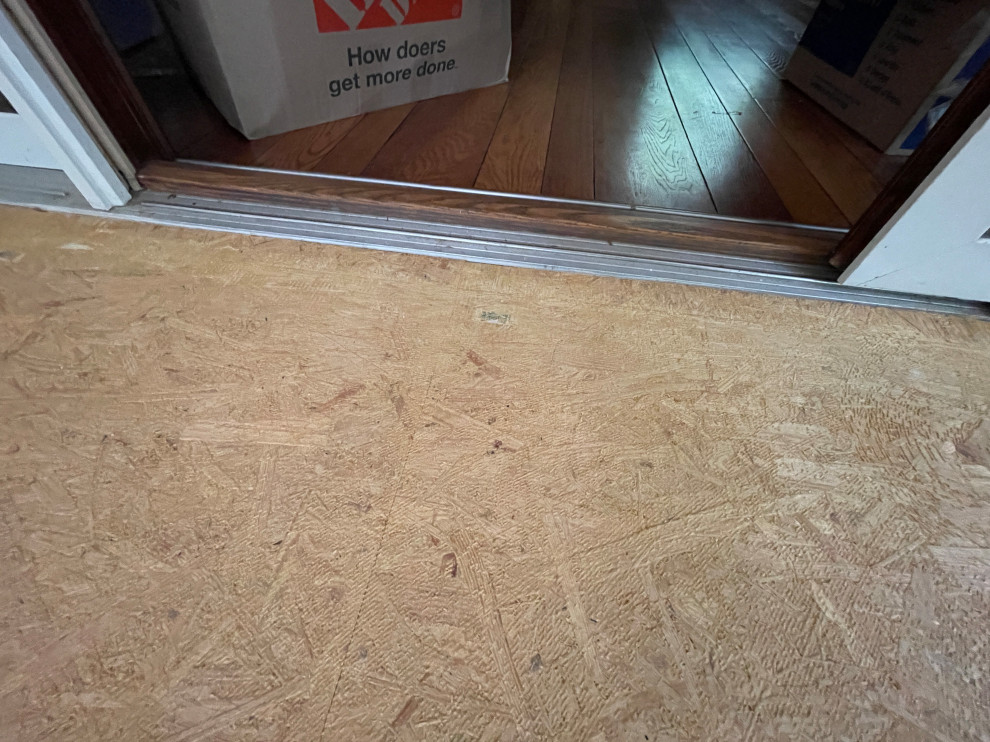 How to transition tile to sliding door?