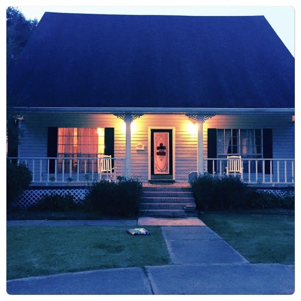 What color to paint our shudders and door on our Acadian style home?