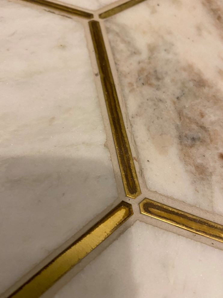 What caused this tile damage?