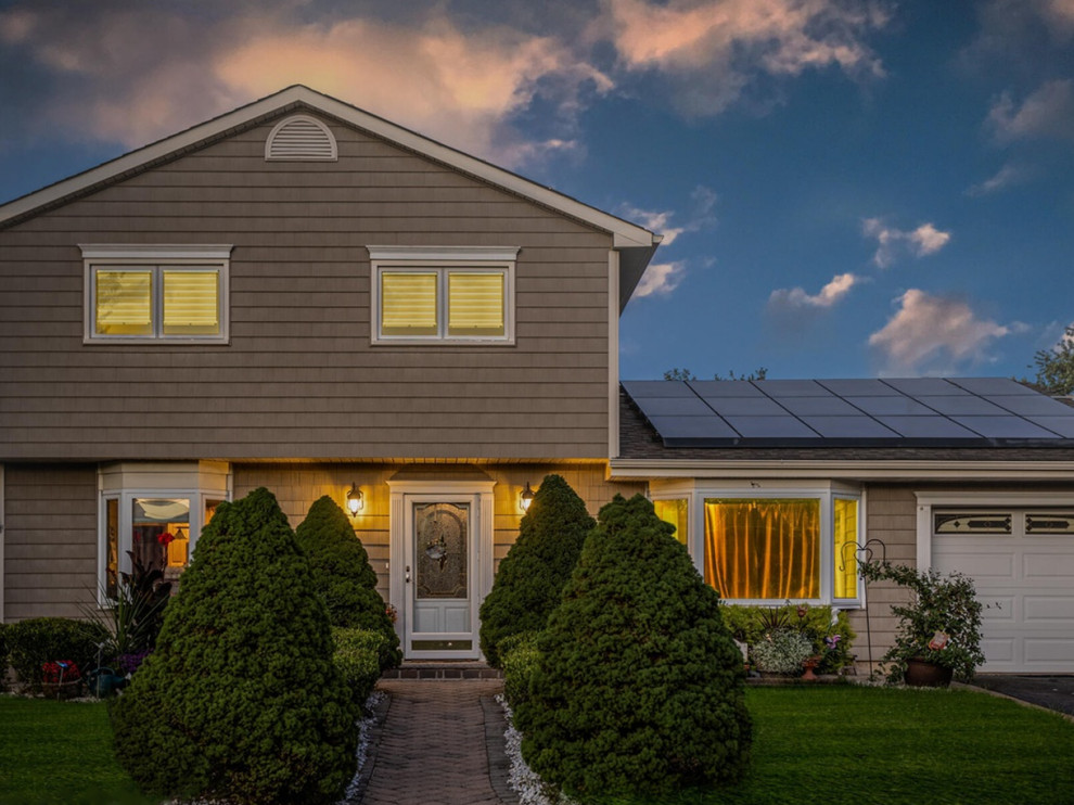 Comfortable Colonial Home With Solar Panels - Traditional - Exterior ...