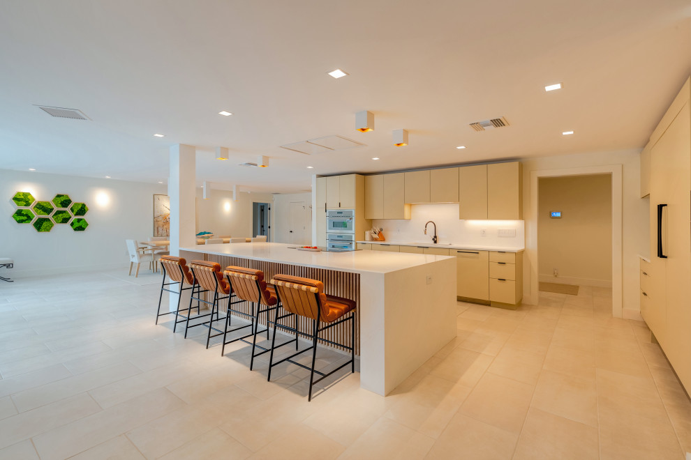 Island-centered kitchen design with material symmetry and functional ...