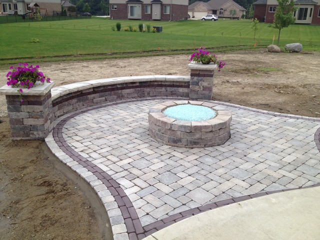 Unilock Dimensional Seat Wall, Fire PIt & Pillars w/ a Unilock Brussels ...