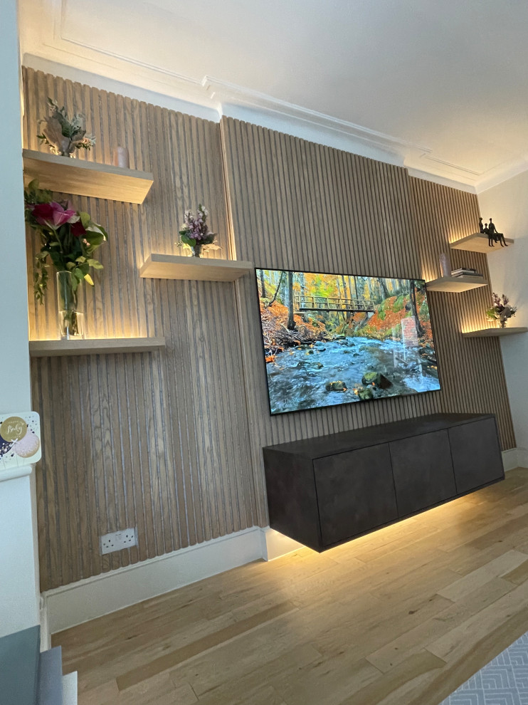 Floating tv unit with floating shelves wall panelling - Mediterranean ...