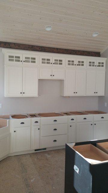 Residential cabinet installation pictures at different stages of ...