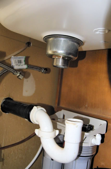 Drain opening in new sink doesn't line up with existing drain pip ...