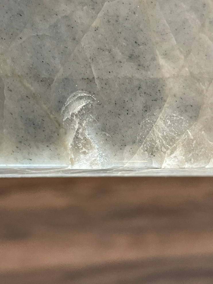 Chipped Quartzite countertops by contractor-advice please