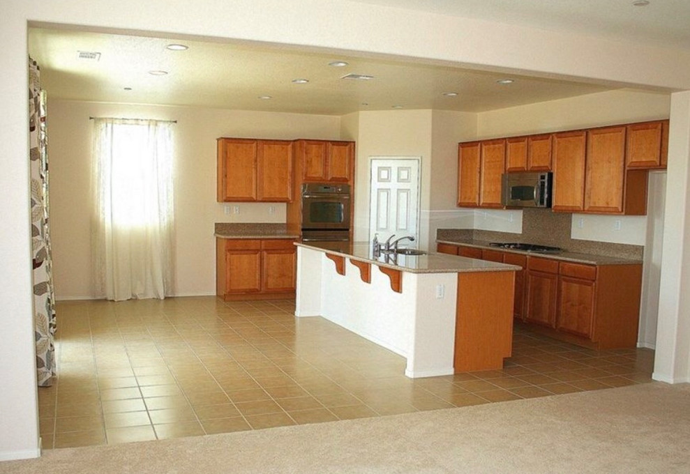 Prefab or custom cabinets and hood for a nine foot ceiling kitchen