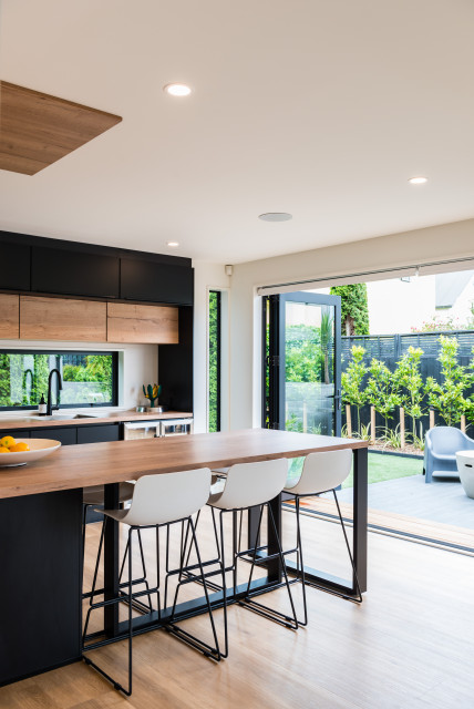 Stunning Black and Wood-Look entertainers kitchen - Contemporary ...