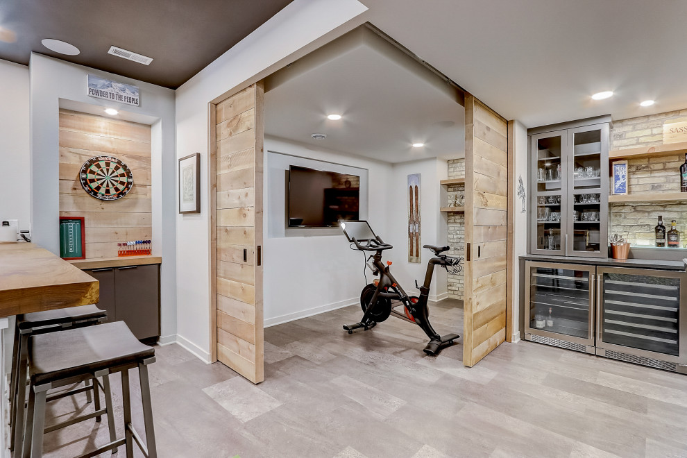 Lower Level Oversized Custom-Made Doors Recess into Walls Creating ...