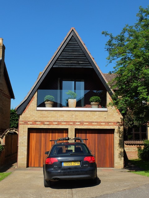 Frameless glass balusrade, gives a double garage a facelift ...
