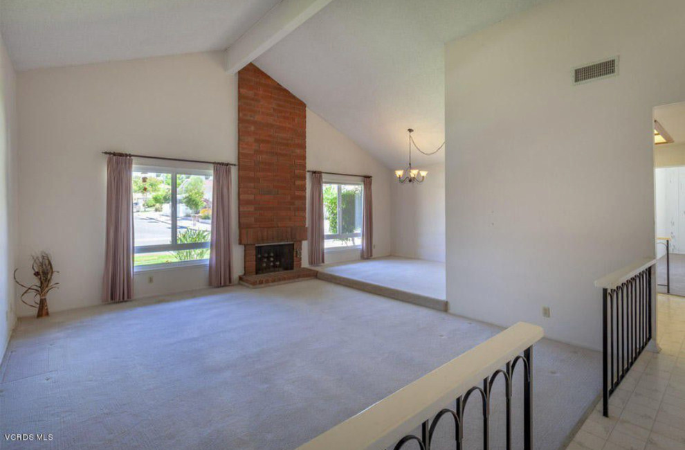 Furniture layout in step down living room/step up