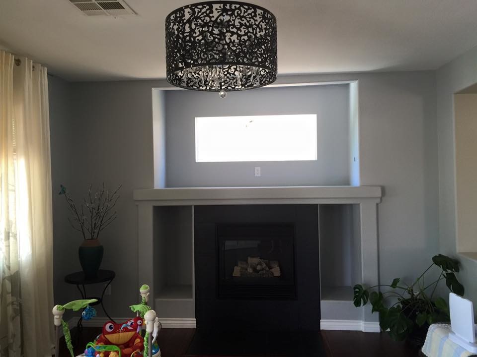 window above fireplace niche ugliness