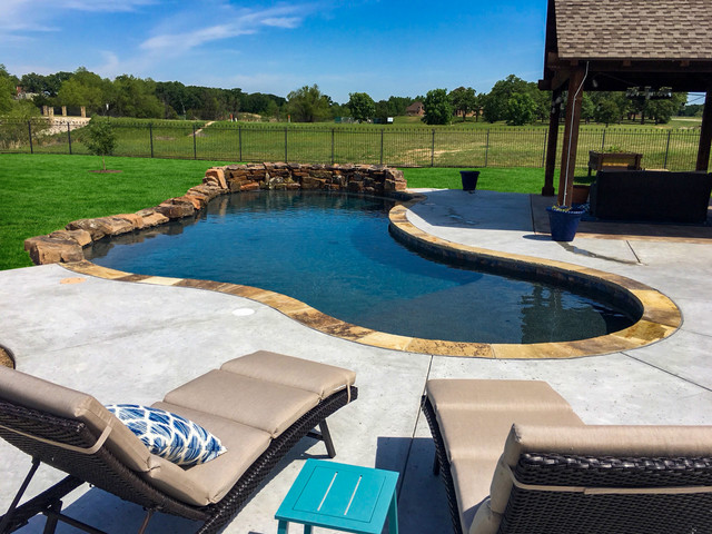 Natural stone meets expansive decking - Rustic - Pool - Dallas - by ...