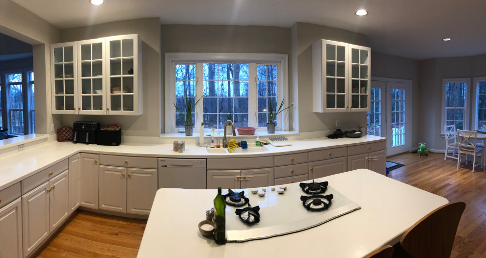 Unequal wall lengths on sides of kitchen window