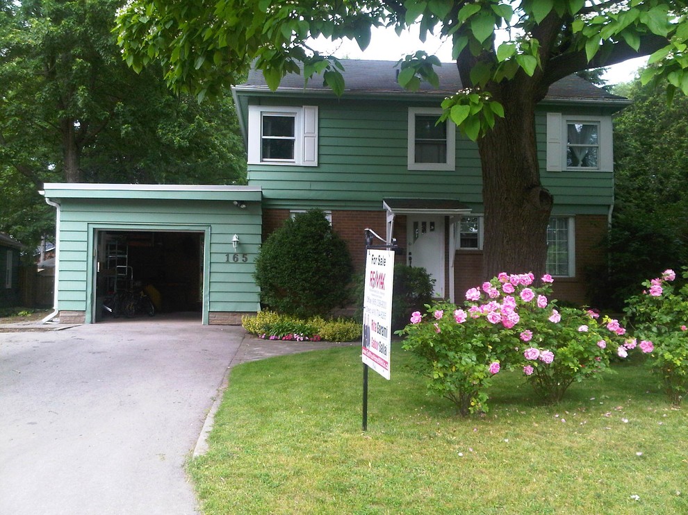 Need ideas to add curb appeal to this 1950's home