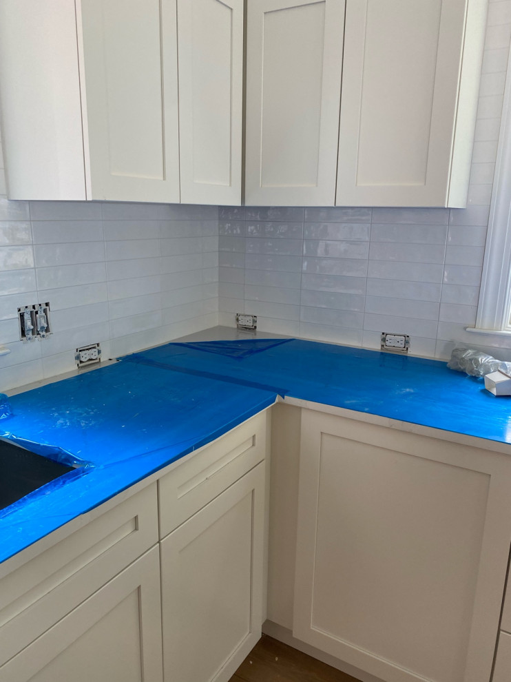 alabaster cabinets and white subway tile?