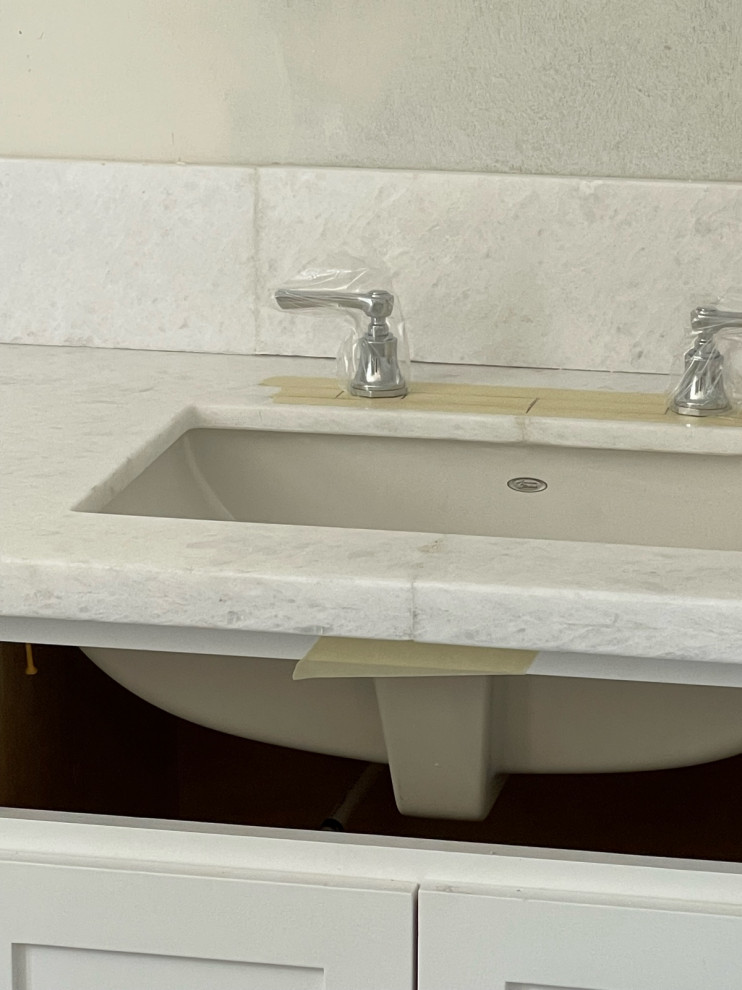 does anyone have a New Opal White marble countertop with a seam?