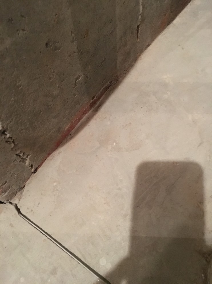 What is red stuff on basement floors and walls?