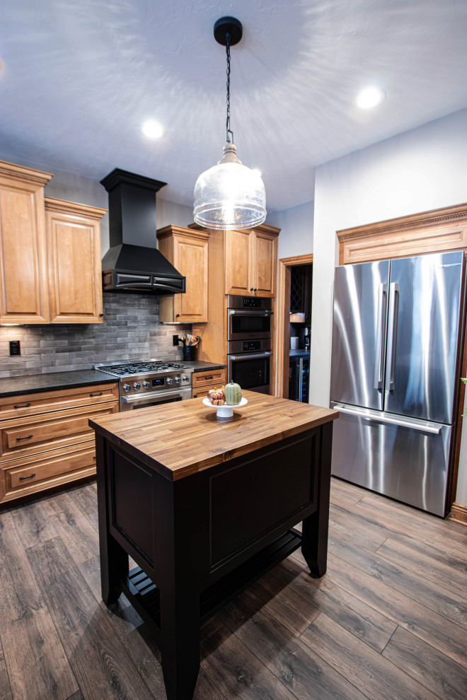 Reconfigured kitchen with new islands, countertops, backsplash ...
