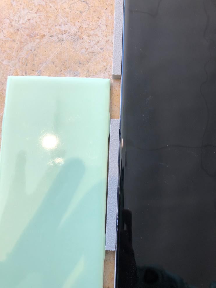 What color grout with mint green tile?