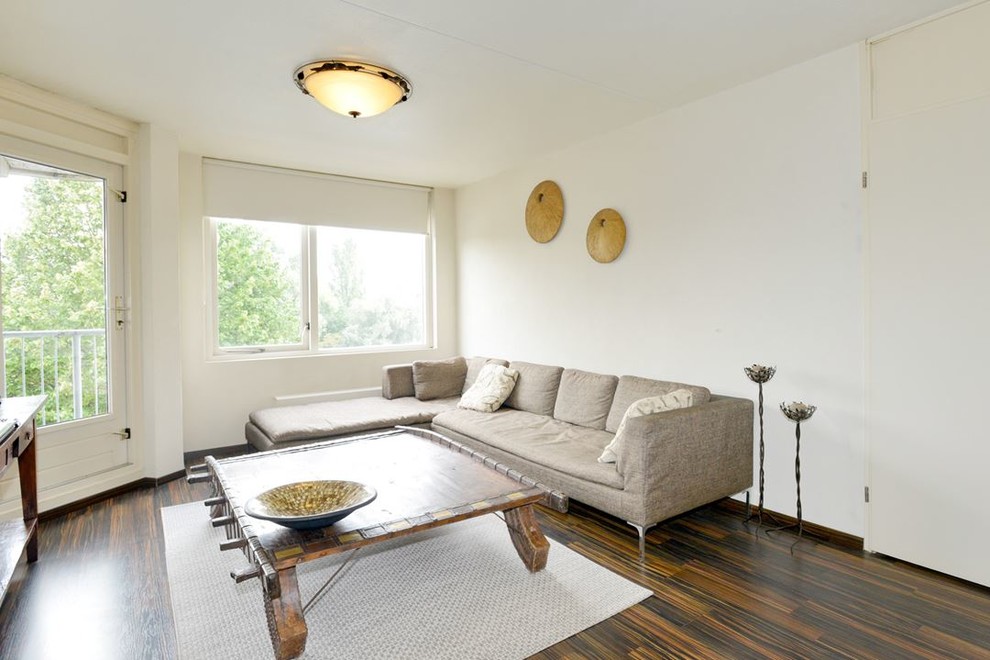 Ideas for small living room with this strange floor