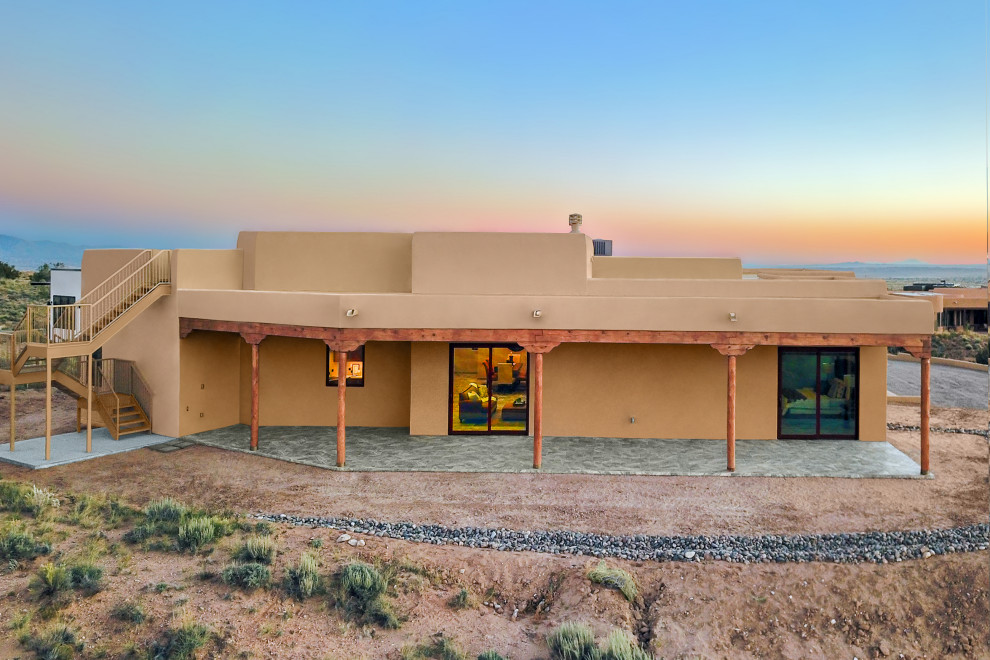 Back view of home with stairs to rooftop deck - Southwestern - Exterior ...