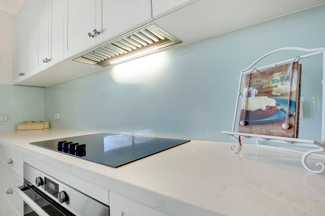 Light blue glass splashback running length of benchtop - Modern ...