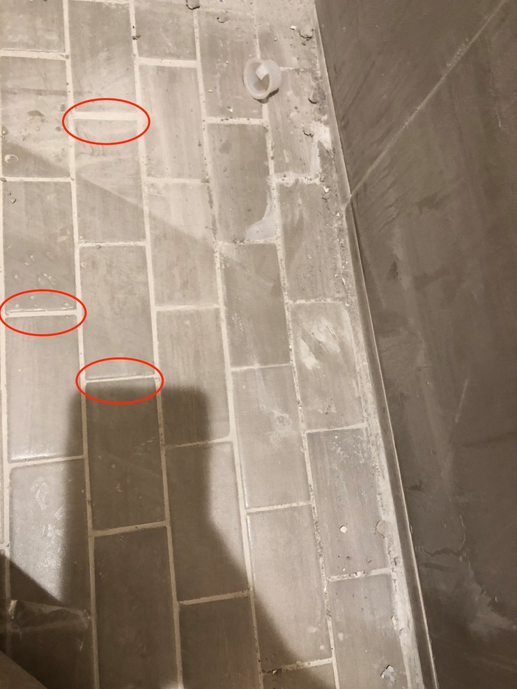 Custom build house - bad tile job or am I crazy/too picky??