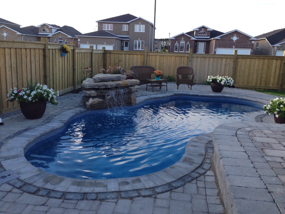 Design build fiberglass pool with a water feature. - Pool - Toronto ...