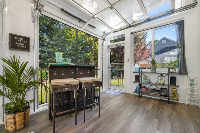 Garage Door Sunroom Oasis - Tropical - Sunroom - Richmond - by Paragon ...